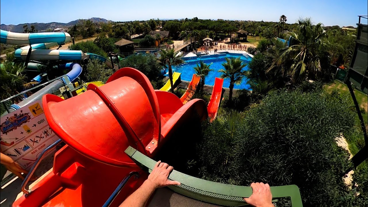 AquaBrava Aqua X Jump Red Jump Waterslide - YouTube