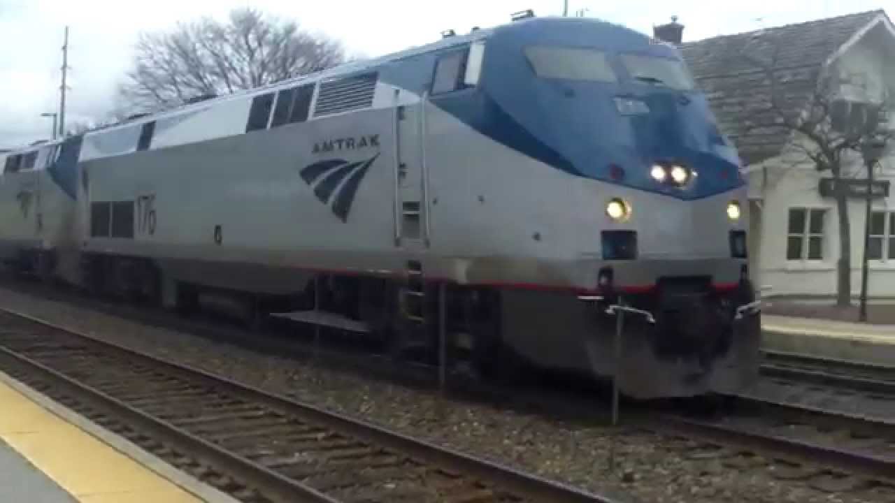 Amtrak 176 leads California Zephyr with oncoming Metra local - YouTube
