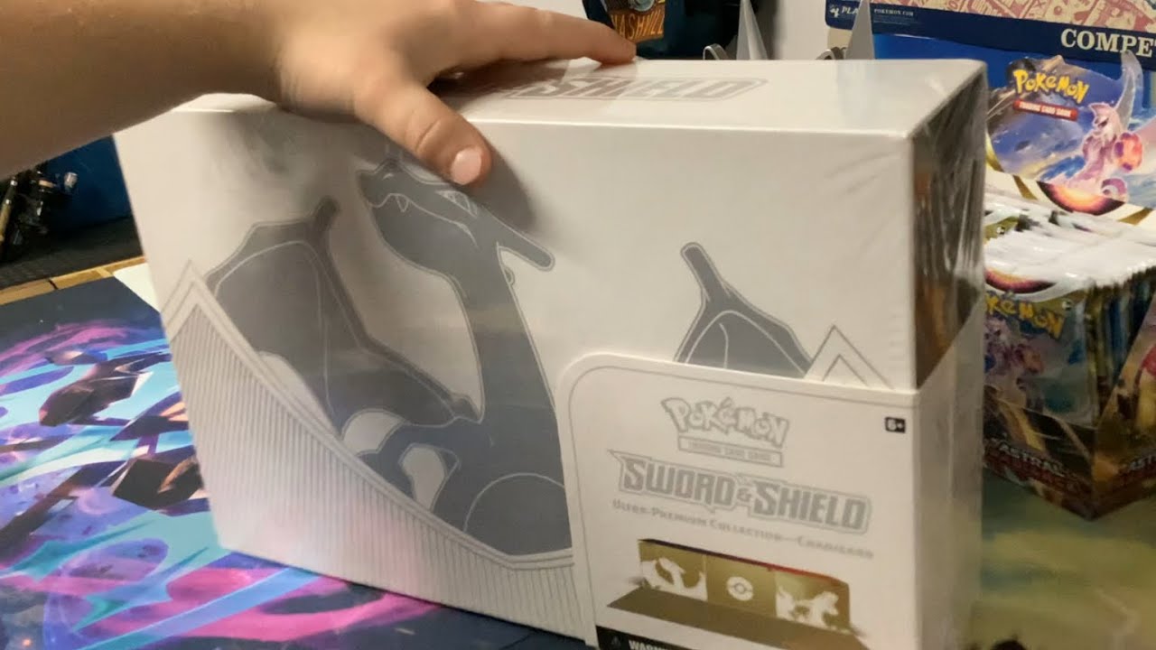 Opening the ultra premium charizard collection box - YouTube