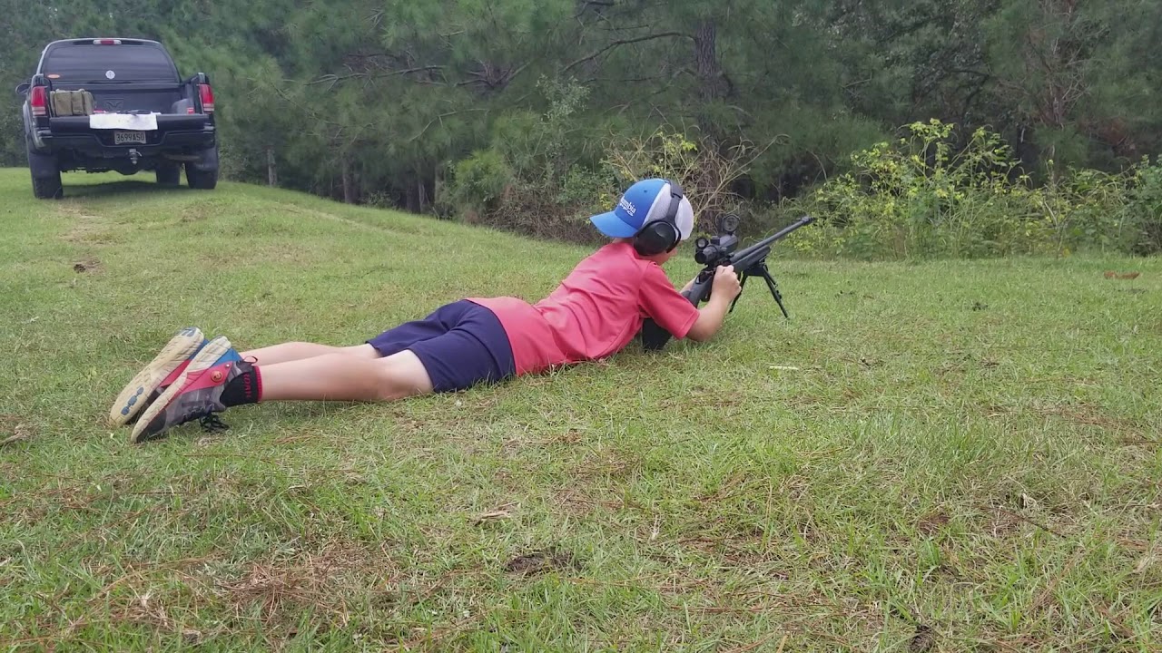 10yr old Cam on the 300 Win Mag Falkor muzzle brake Thompson Center ...