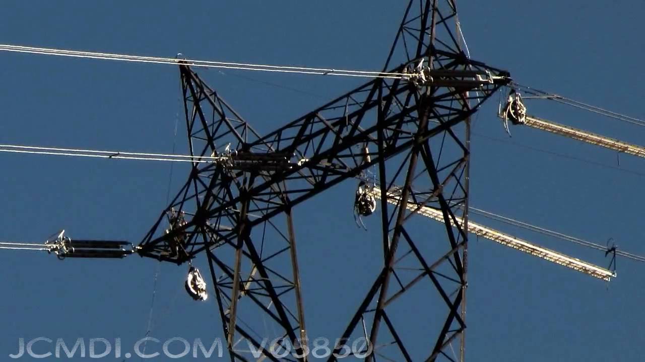 V05850 500kv Powerline- men working on tower timelapse - YouTube