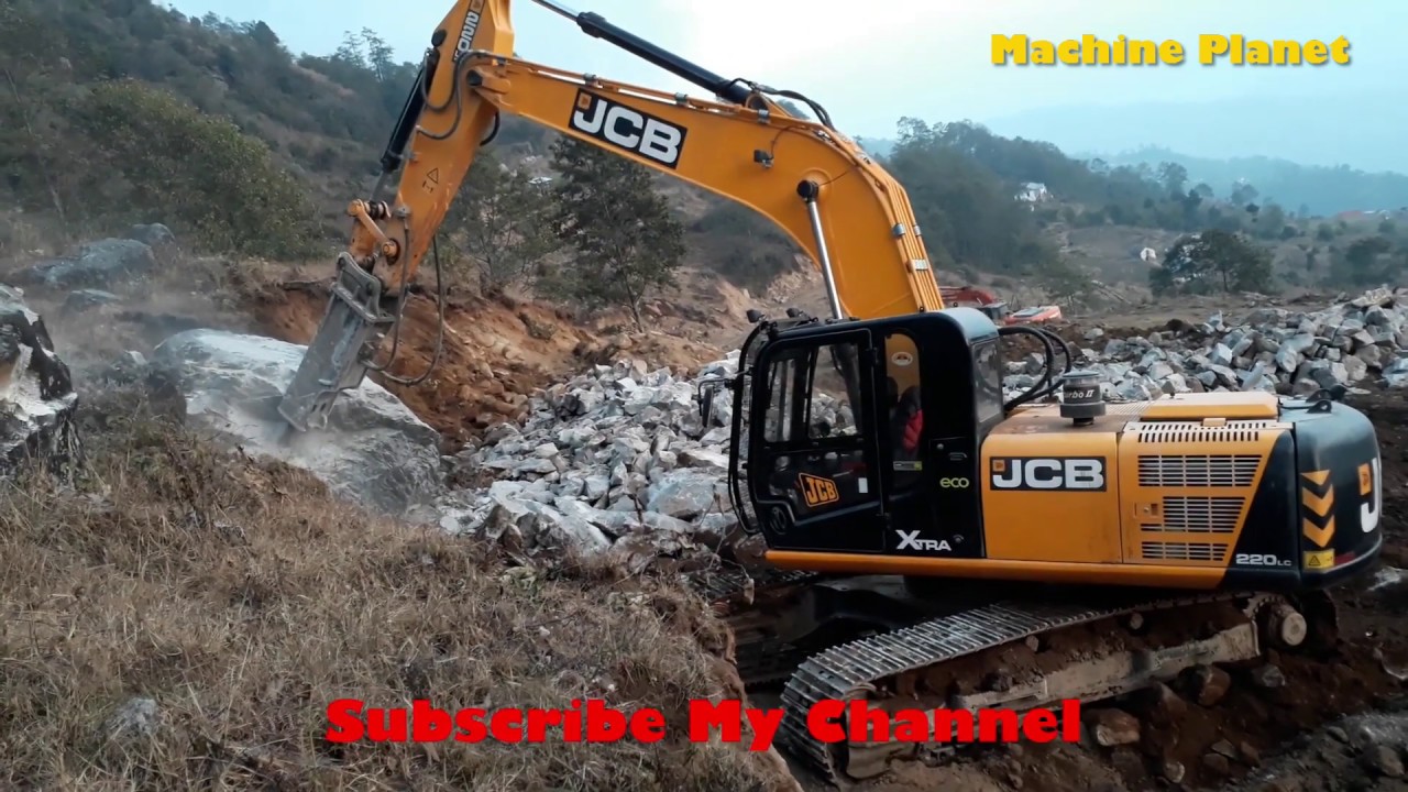 JCB Breaking Big Stone - YouTube