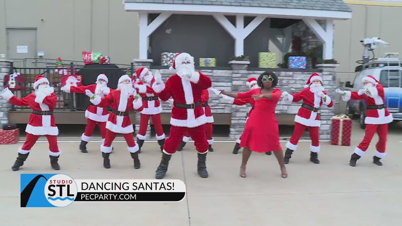You can’t help but be happy with dozens or more dancing Santas - YouTube