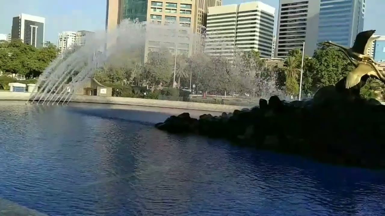 Beautiful view of the water fountains and the ocean along with the ...