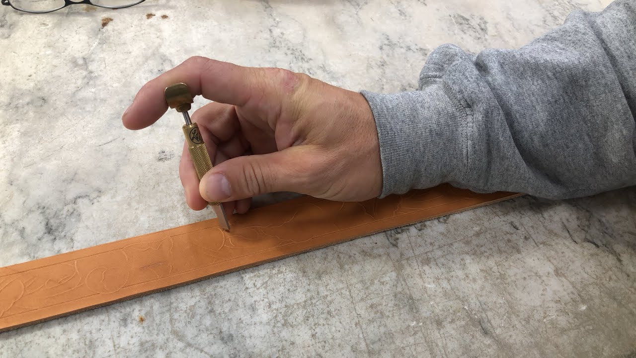 Cutting in a new belt pattern- the first step in tooling a leather belt ...