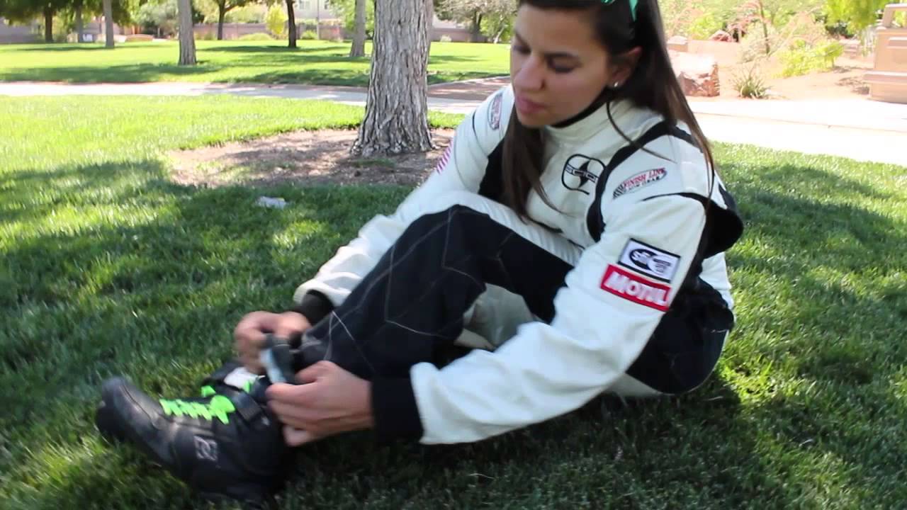 Michele Abbate shows off her custom Finish Line Race Gear driving suit ...
