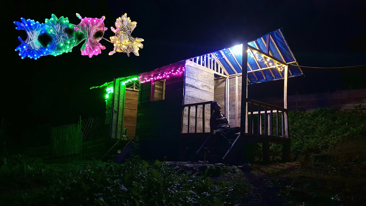Install decorative colored lights for wooden houses in the forest, free ...