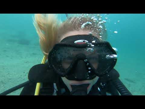 @TrinaMason underwater chanting AUM OM talking scuba diving swimming wet suit no fins dive mask