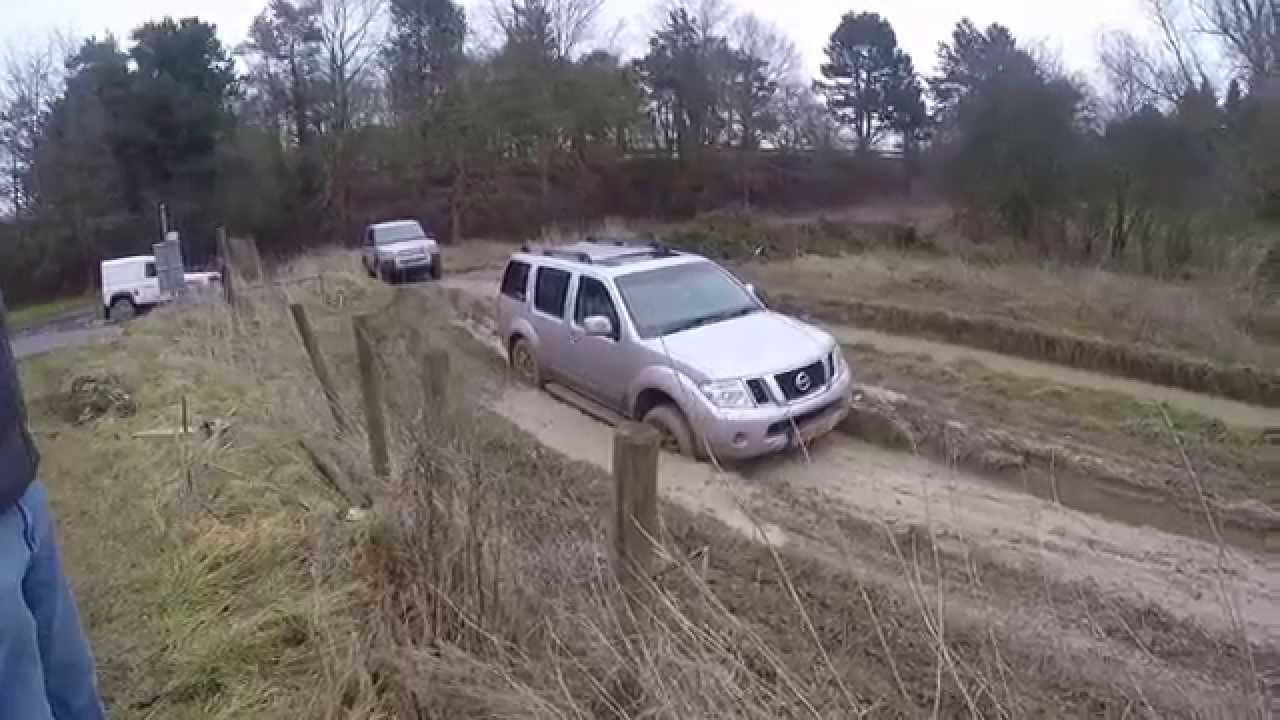 Nissan Pathfinder playing in the mud - YouTube