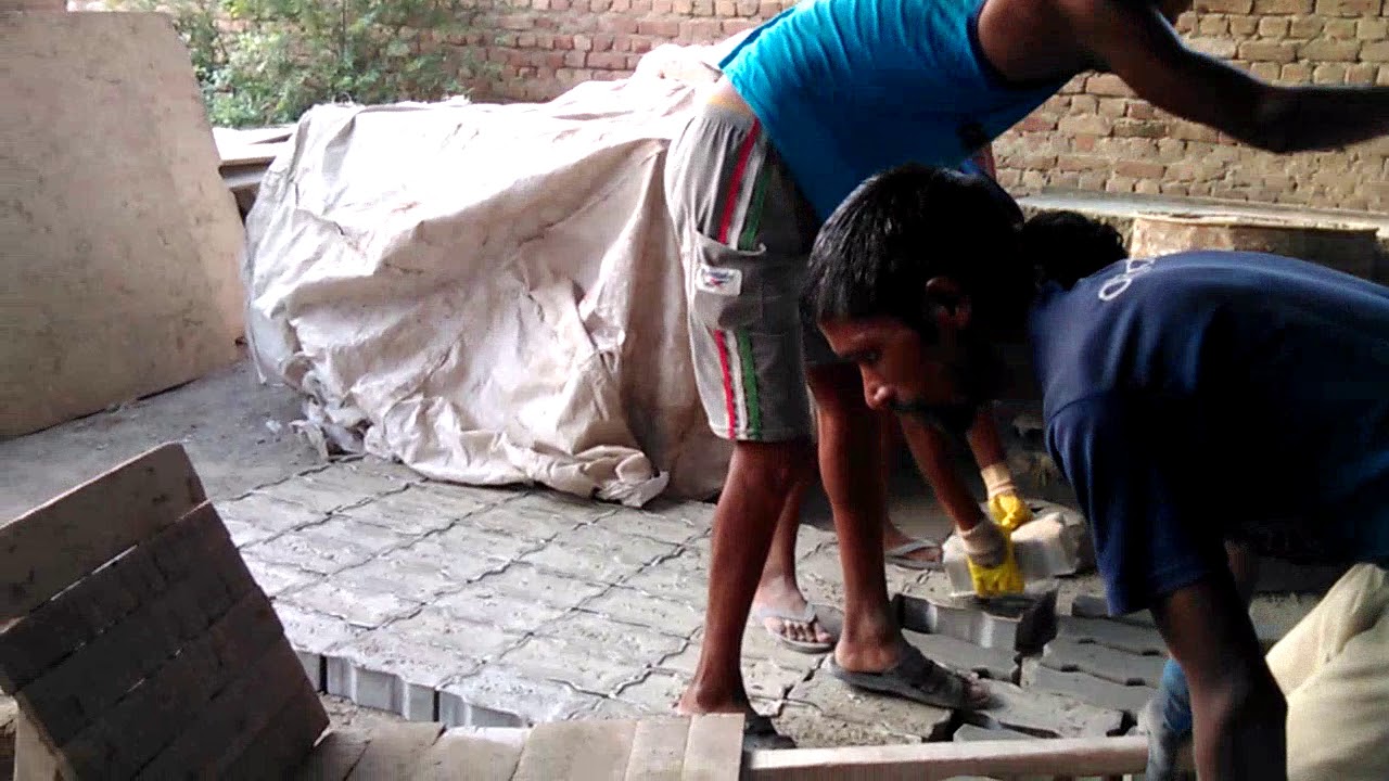 Tebal vibrated Interloking tiles opening - YouTube