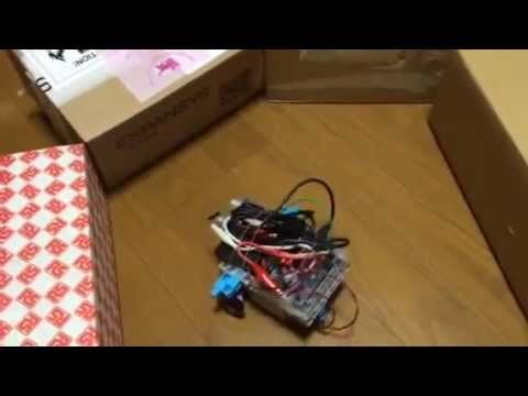 Simple robot with an ultra sonic range finder (HC-SR04) and Studuino
