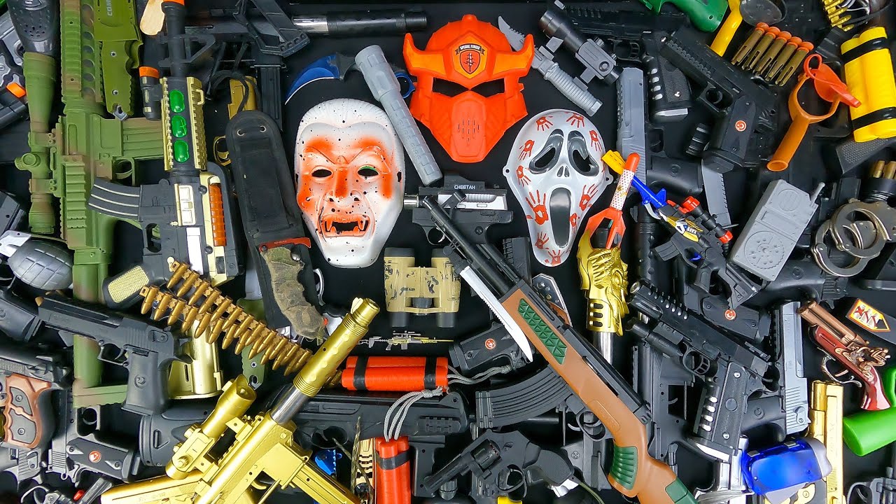 Various Horror Masks And Kalashnikov AK-47, Tec-9, Toy Guns, Realistic ...