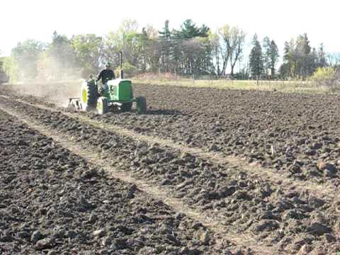 Discing large seed into soil - YouTube