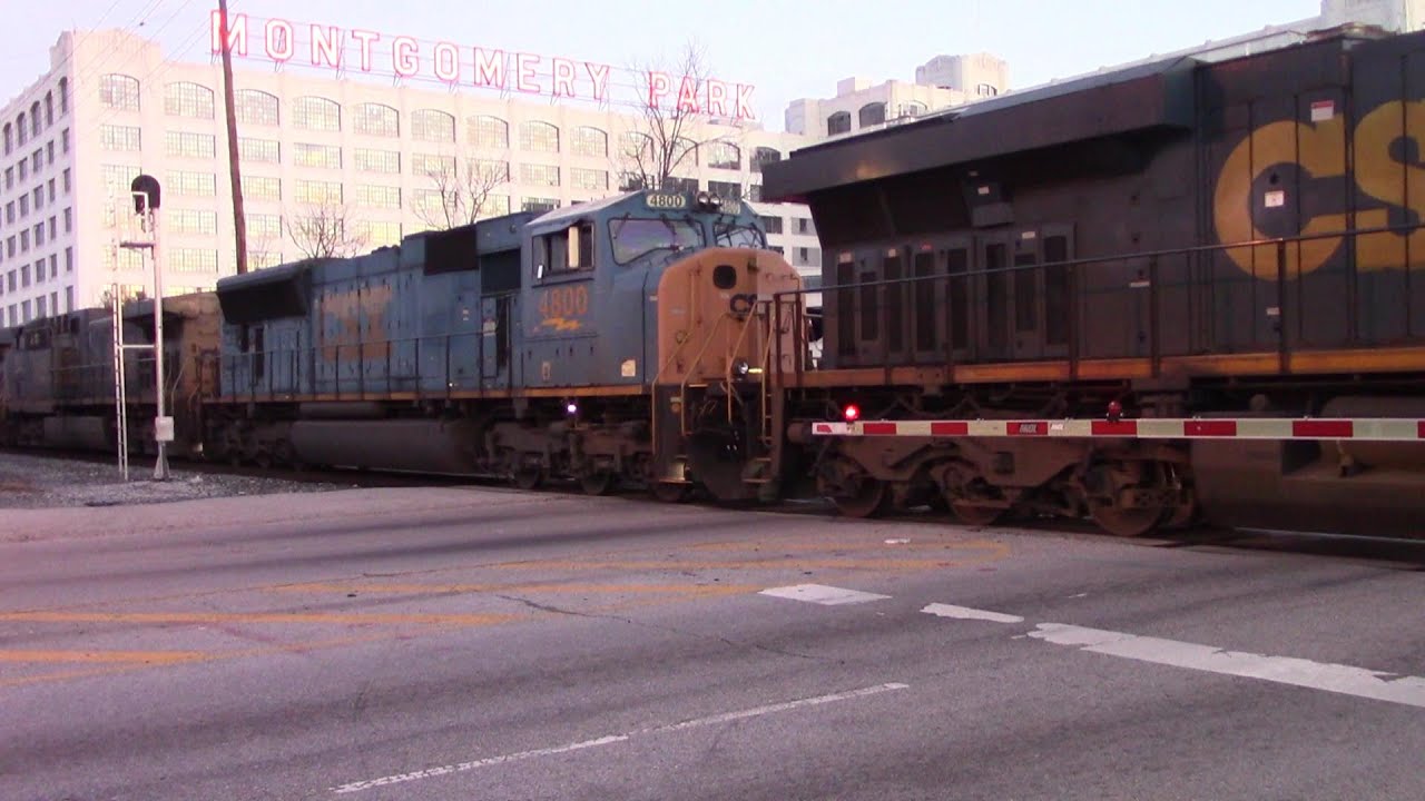 CSX SD70AC 4800 trails crossing Washington BLVD on Y334-09 behind the ...