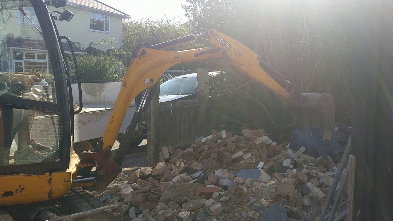 Digger work on the extension - YouTube