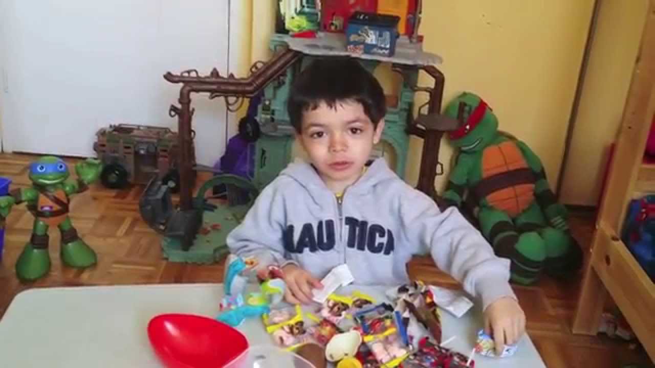 Darius The Kid opening a kinder surprise egg - YouTube