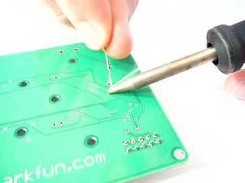 Soldering a reset button - YouTube