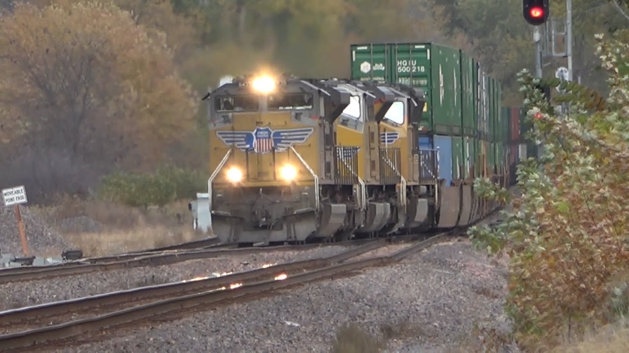 Union Pacific crossover move under the drone! Long speed building coal train, mix, priority ...