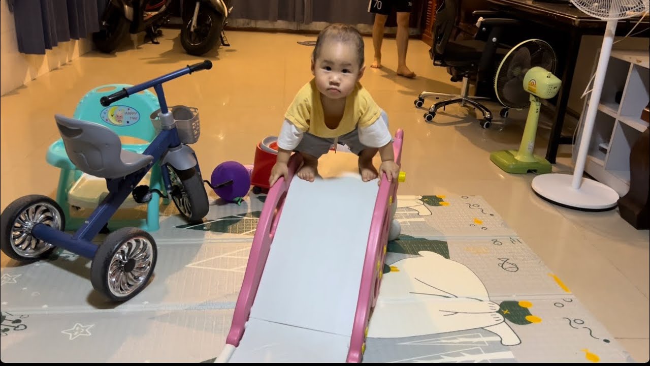 Cute baby happy with slider. - YouTube