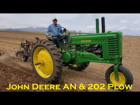 1948 John Deere A Plowing with JD 202 Plow - YouTube