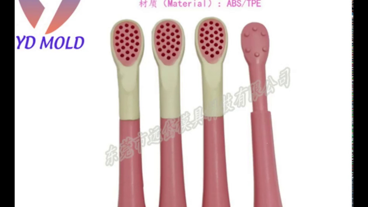 Toothbrush head two color two shot mold injection Video - YouTube