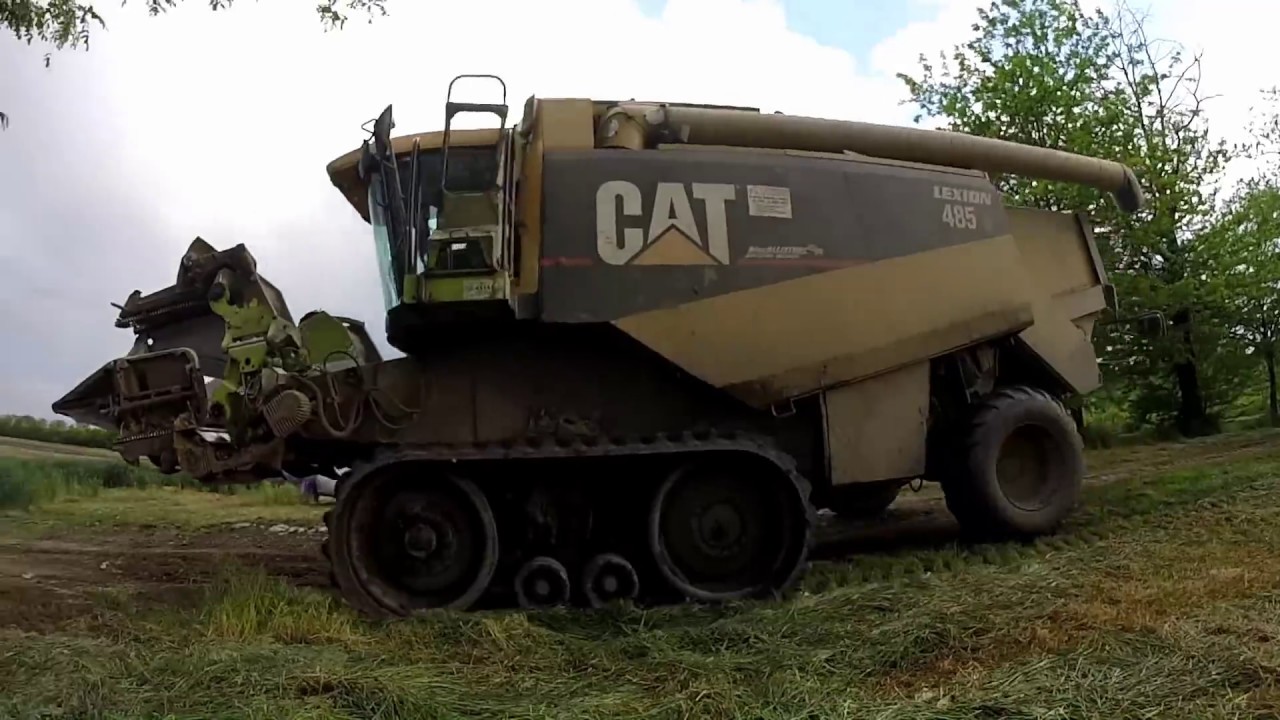CAT Lexion 485 Kukorica aratás Májusban 2015 Gopro - YouTube