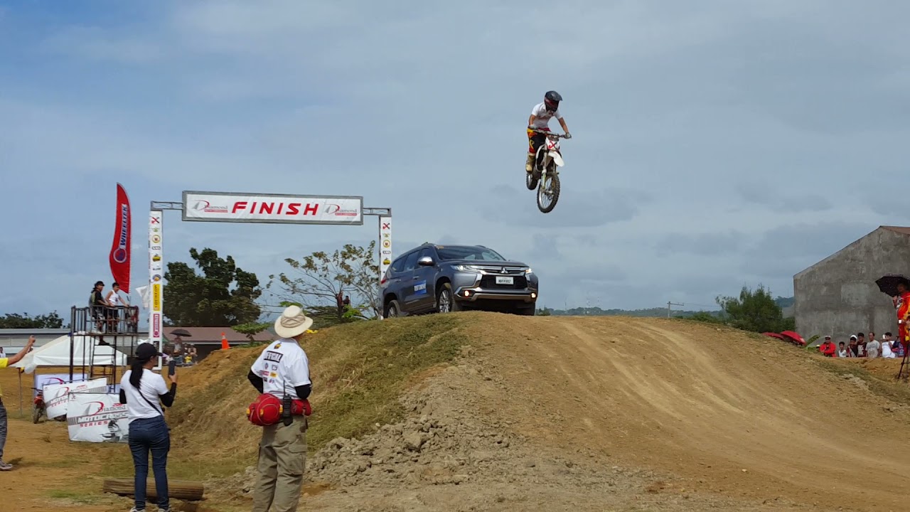 Coach Sam Tamayo stunt jump over an SUV! - YouTube