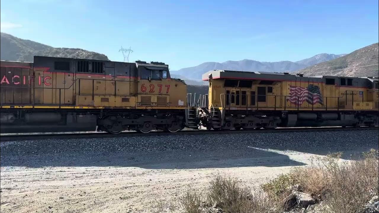 UP 6047 Leads Northbound Manifest Train Rolling Through Blue Cut CA - YouTube