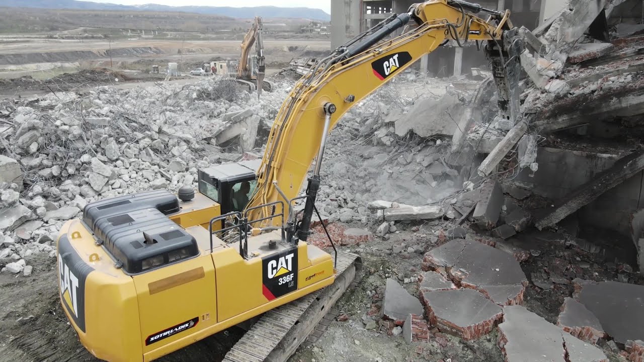 Caterpillar 336F With Caterpillar Hydraulic Hammer Breaking Down A ...