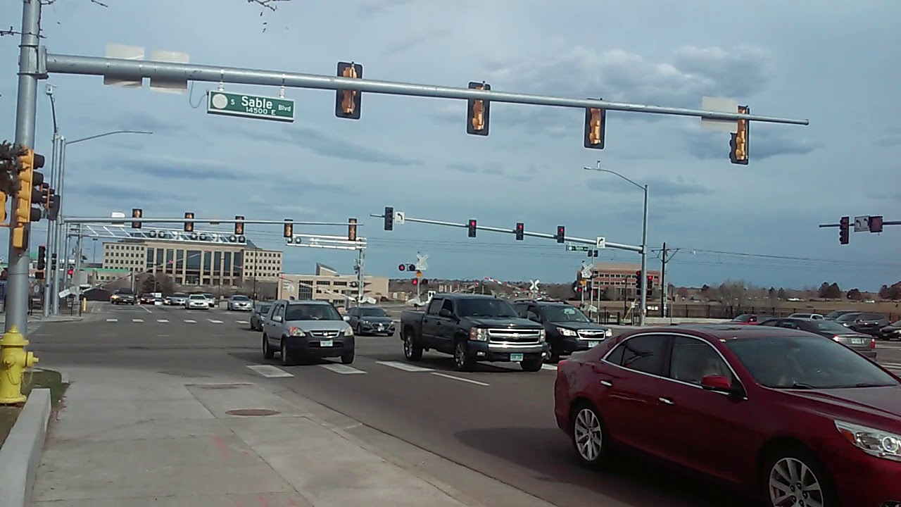 2 SD-100 Light Rail Trains at S Sable Blvd + Alameda Ave in Aurora, CO ...
