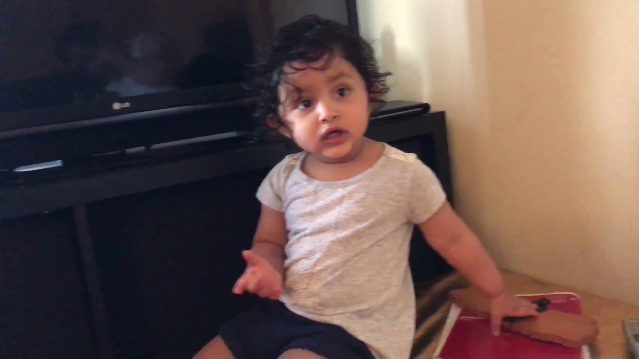 Baby Pretending to Talk on The phone. Funny Video of a Baby Talking on ...