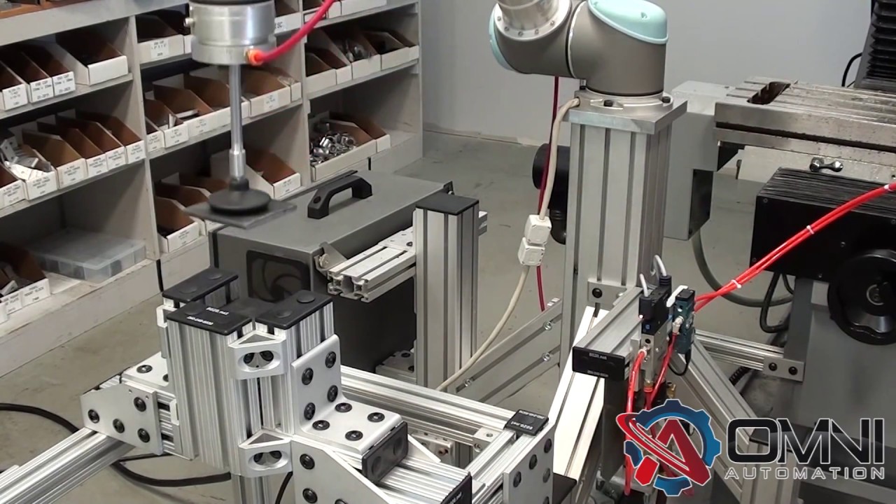 UR 5 Machine Tending Robot - YouTube