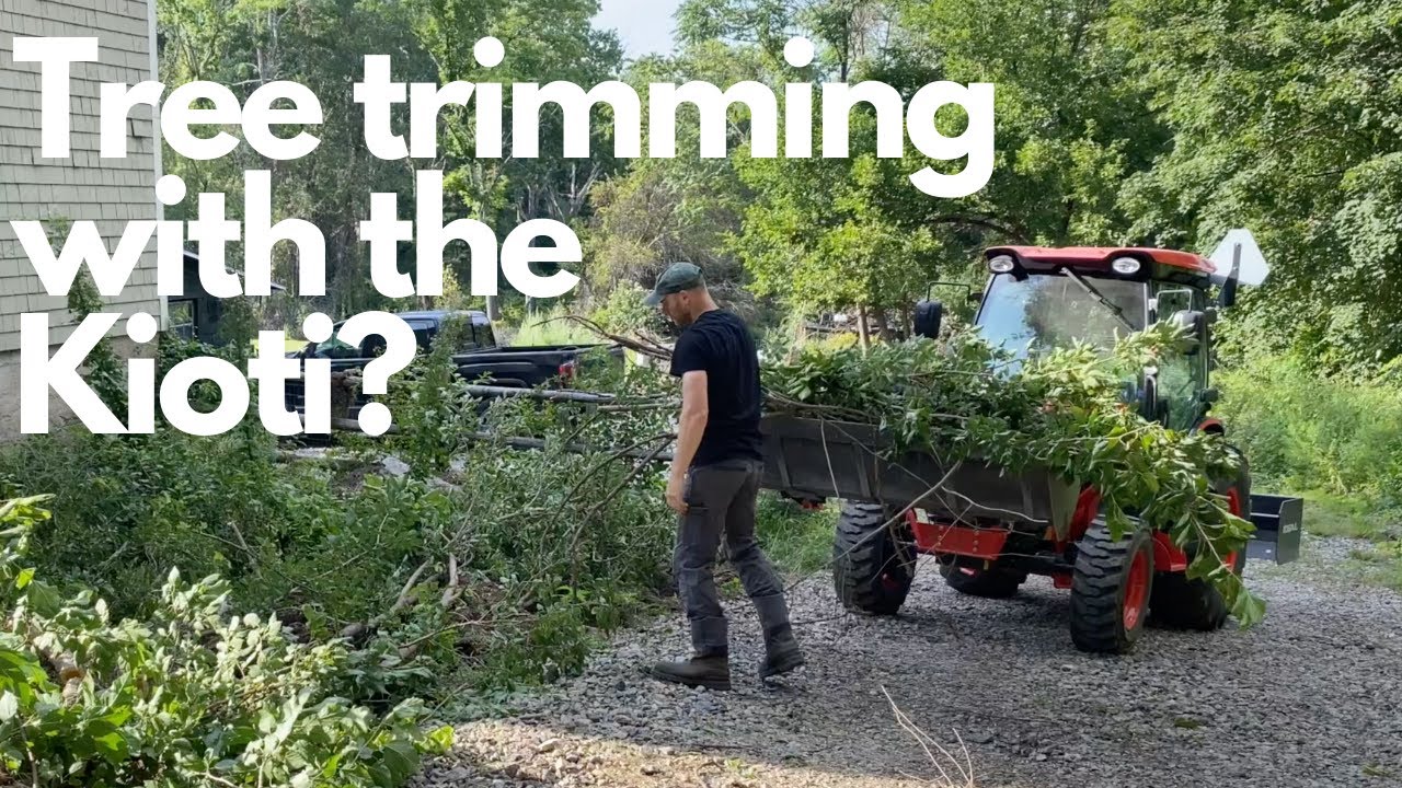 Safe tree trimming with the Kioti tractor. Taking down an overhanging ...