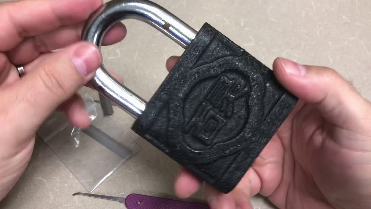 Core shimming an old Lark Chinese Cast Iron Padlock - YouTube