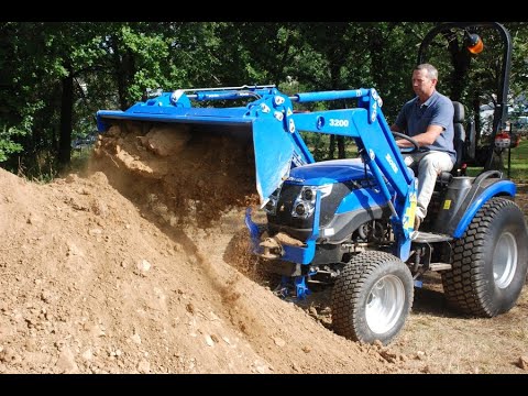 Încărcător frontal Solis 3200 la 300 kg (official video) - YouTube
