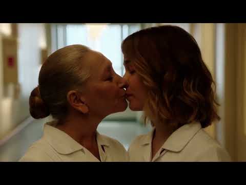 Older and Younger Nurse Kissing 2024