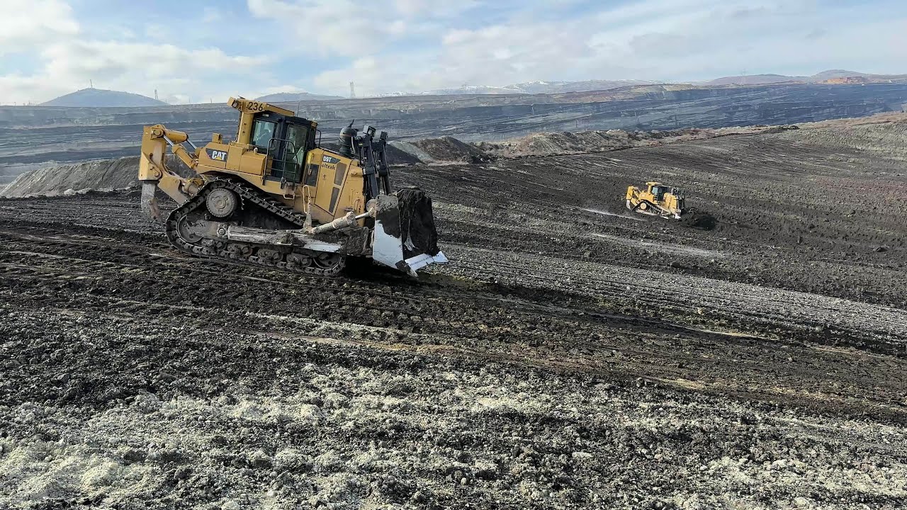 Two Caterpillar D9T Bulldozers Working On Huge Mining Area - 4k - YouTube