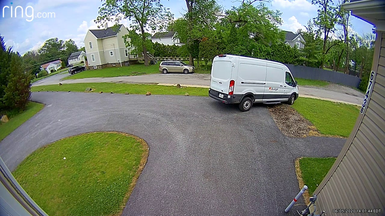 Budget Vehicle Drives Through Front Yard - YouTube