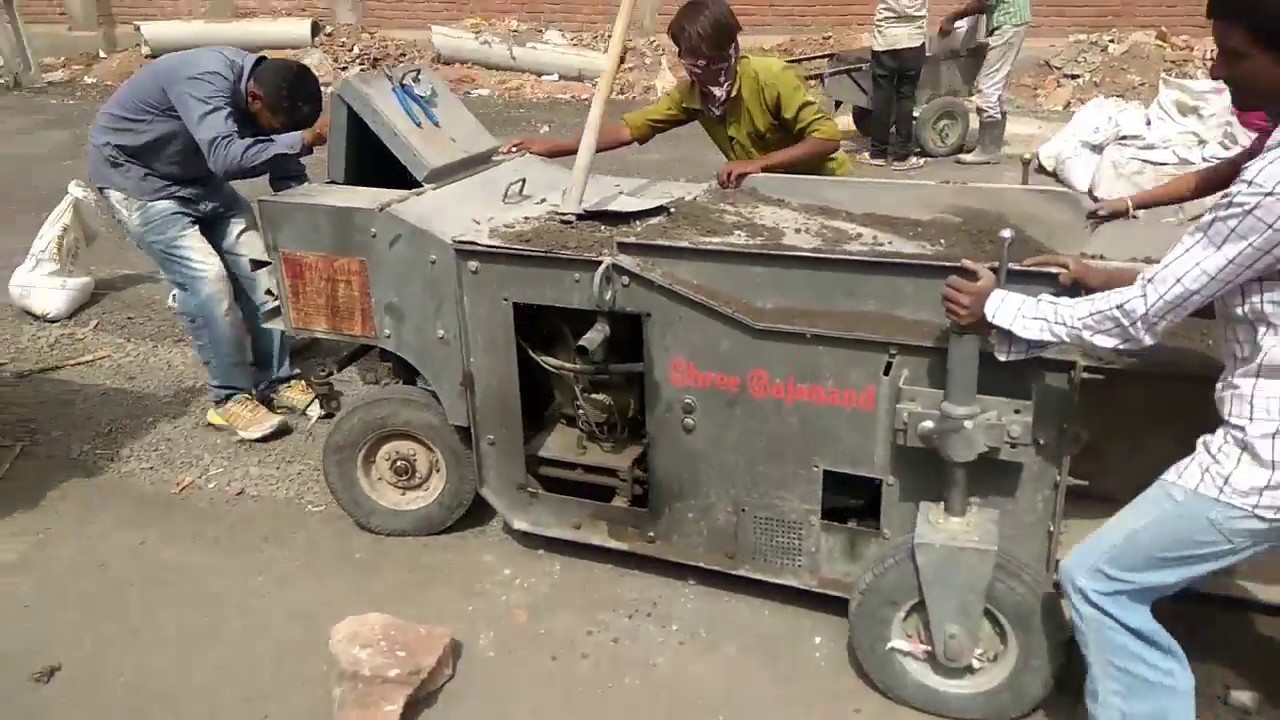 Concrete Curb(divider) Making by Machine - YouTube