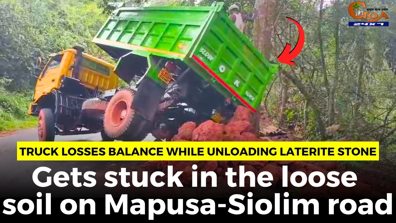 Truck losses balance while unloading laterite stone. Gets stuck in the ...