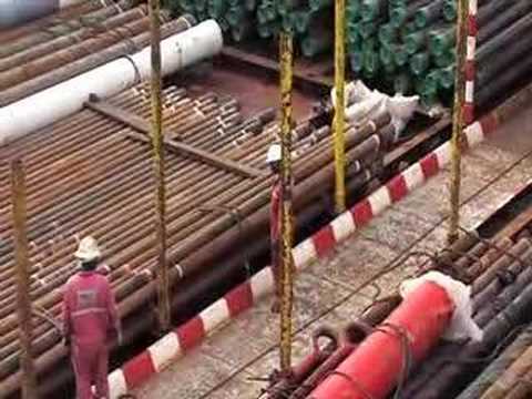 Oil rig pipe deck pipes moving - YouTube
