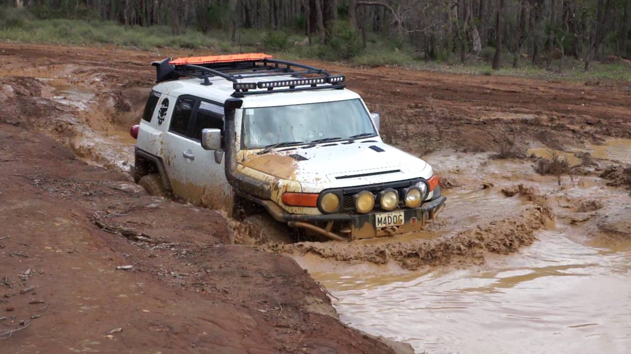 FJ Cruiser in a mud pit - YouTube