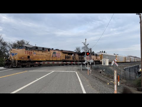 UP 7388 leads UP 5988 and seventy autoracks - YouTube