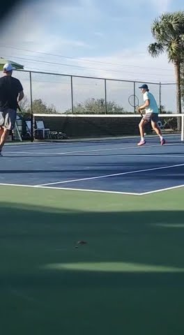 Brian Battistone serving with the two-handled tennis racket - YouTube