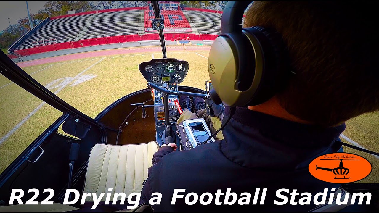 Robinson R22 Helicopter Drying a Football Stadium - YouTube