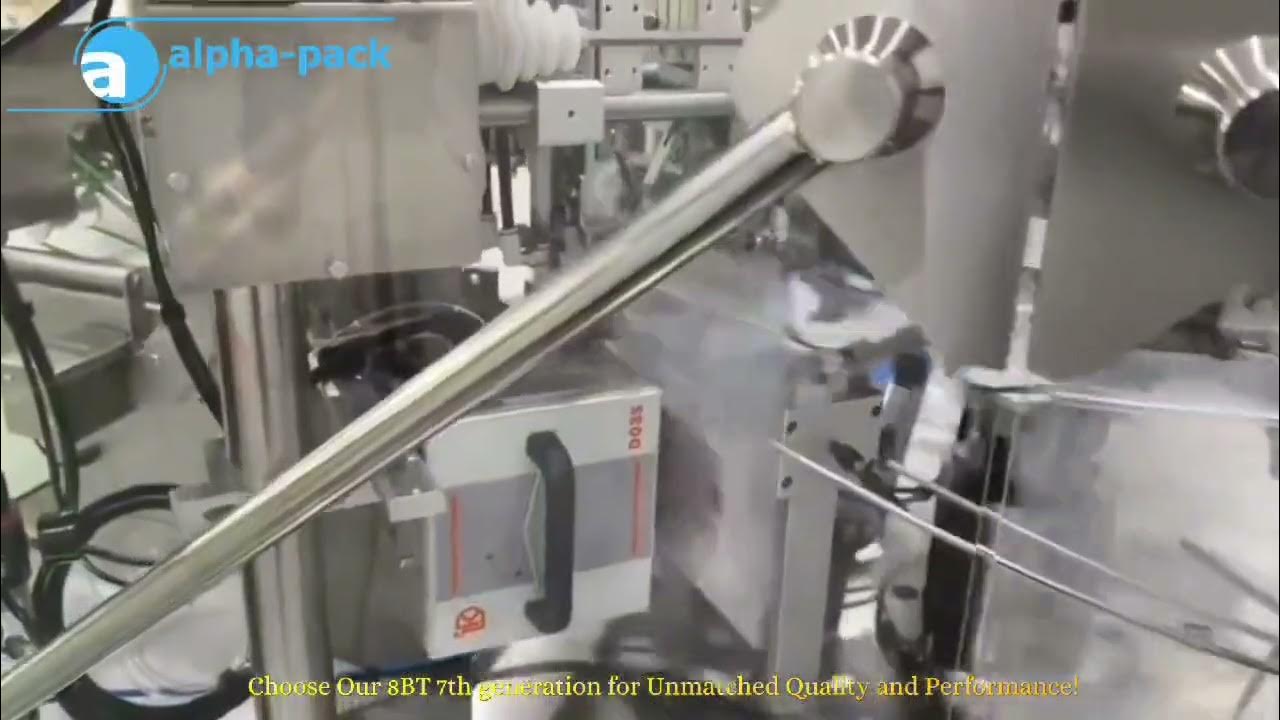 8bt Vii Rotary Fillingandsealing Machine And The Fourth Station Spraying Alcohol For Disinfection