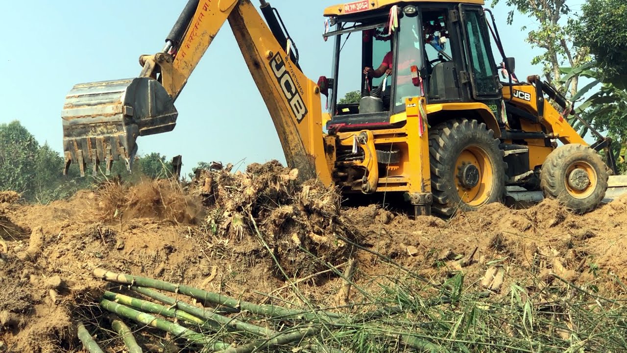 Backhoe Loader Machine Uprooting Bamboo @droneplanet2040 - YouTube