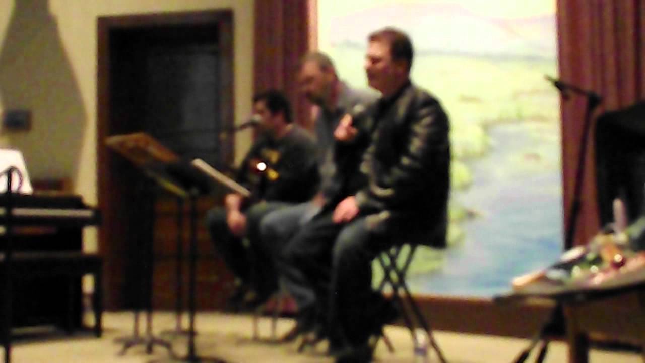 Michael Gavin singing at a concert - YouTube