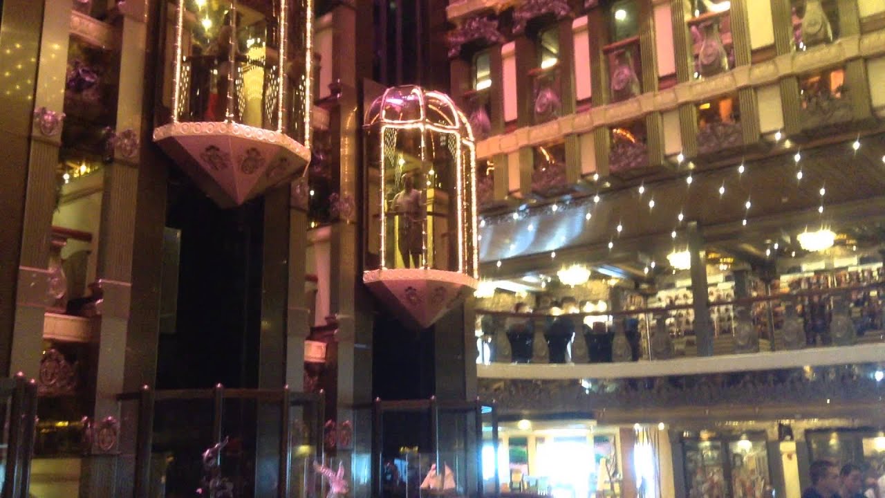 Day-o dancing on the Carnival Pride Atrium elevator - YouTube