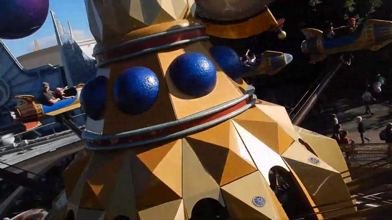 Astro orbiter rocket ship ride at disney land california - YouTube